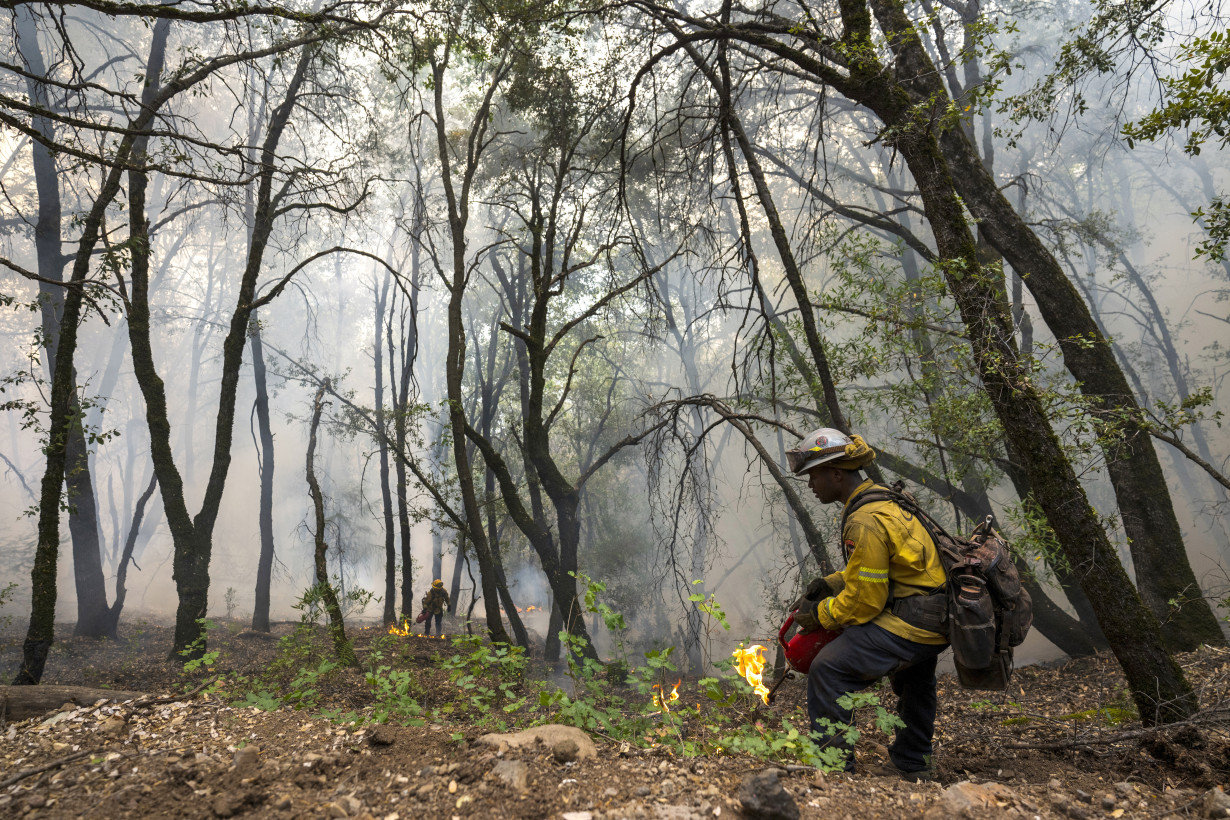 LA Post: Firefighters helped by cooler weather battle blaze that has ...